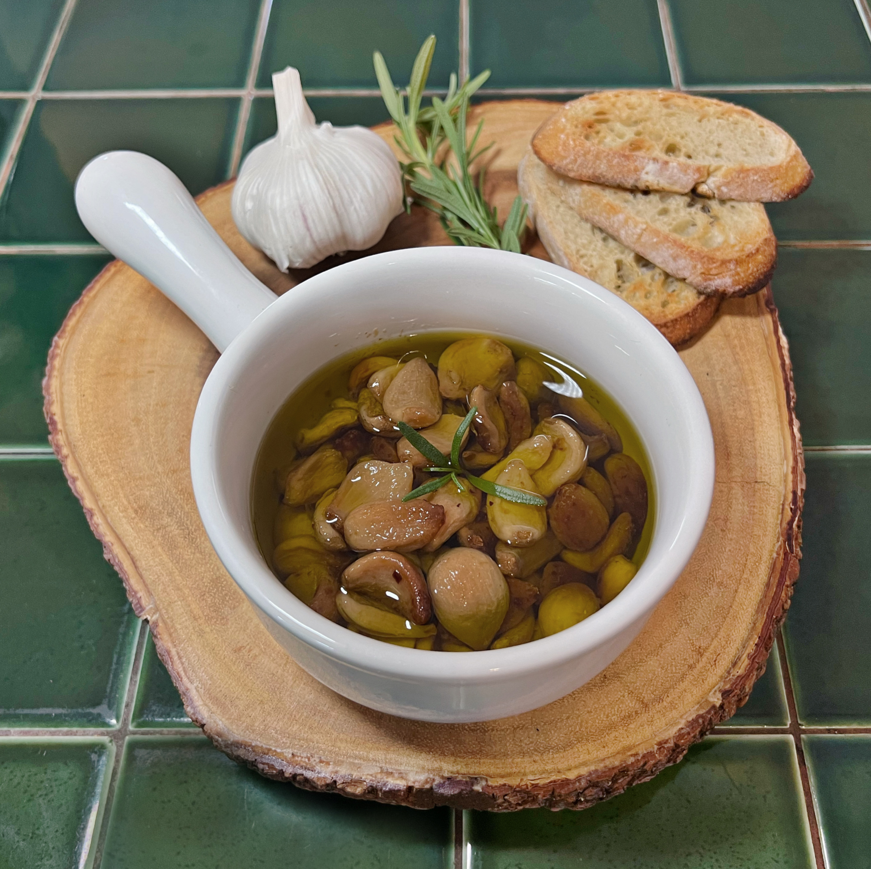 Garlic Confit in Olive Oil - amandapetito